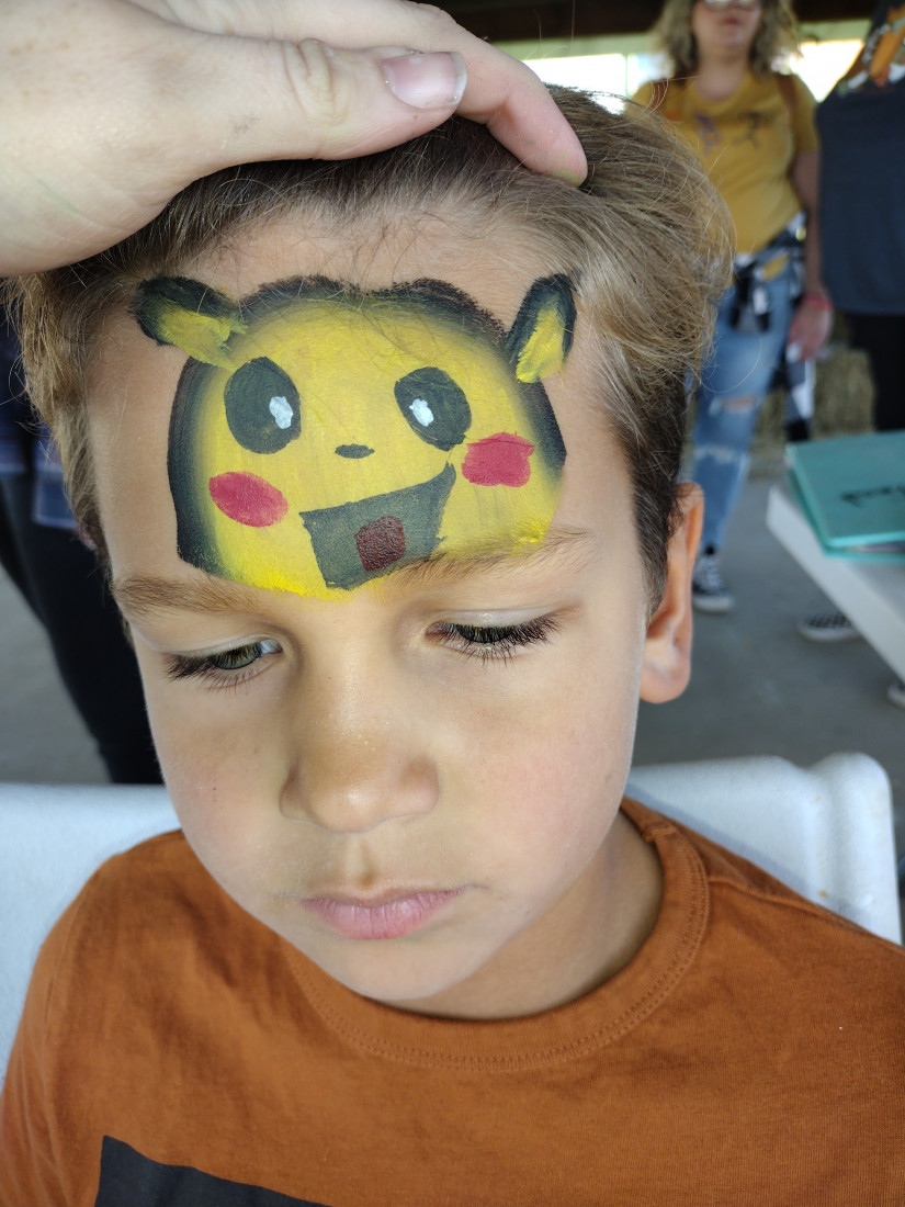 Hire Glittering Ember Face Paint - Face Painter in Punxsutawney ...