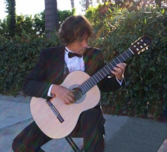Hire Classical Guitarist Dana Starkell - Guitarist in Iowa City, Iowa